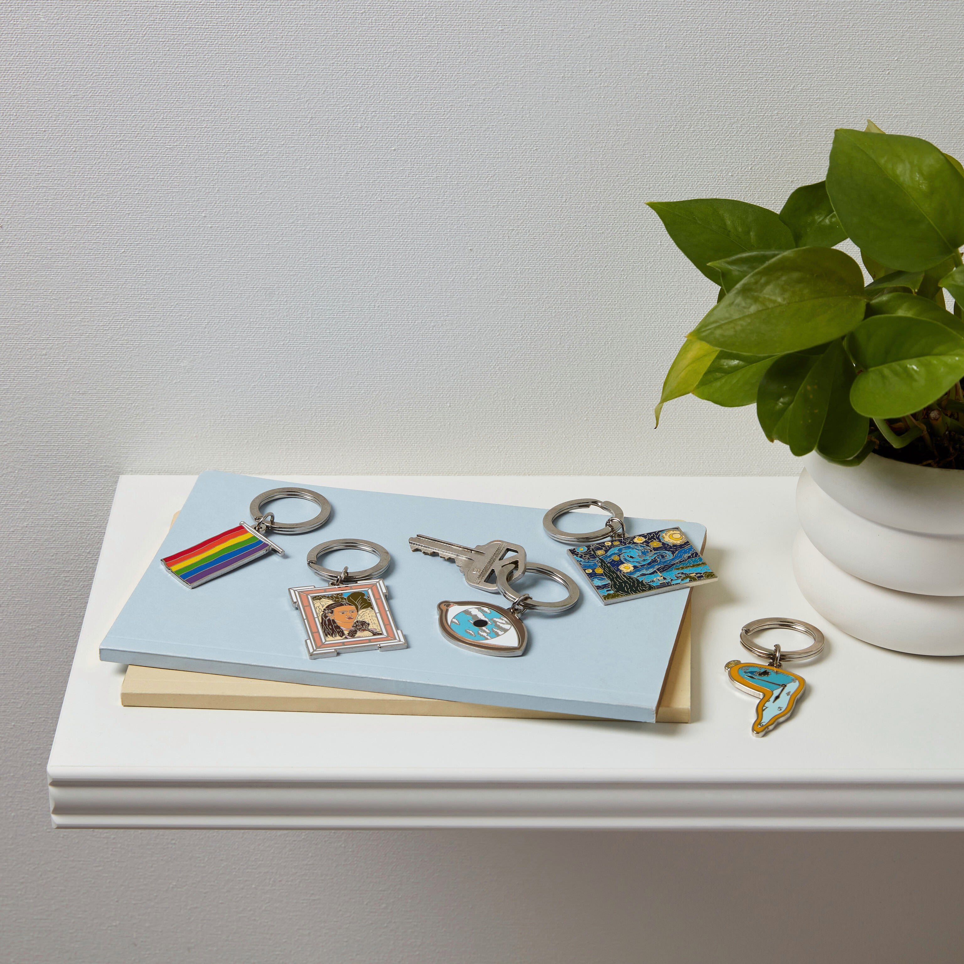 MoMA Artist Enamel Keyrings - Magritte – MoMA Design Store