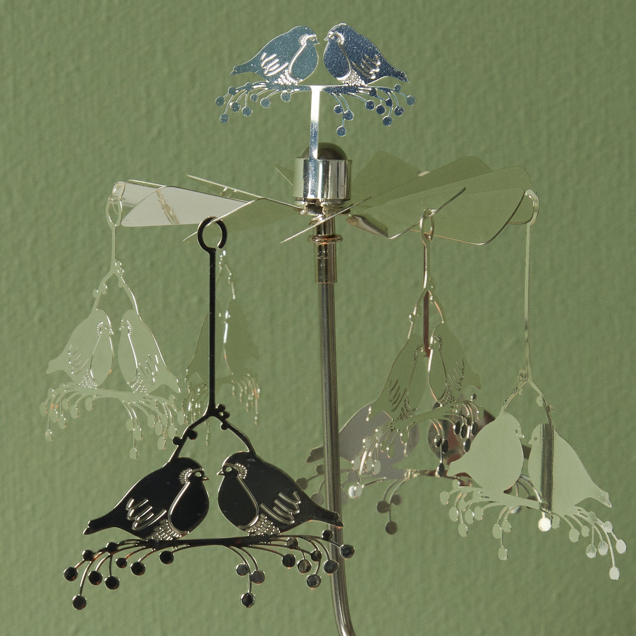 Rotary Birds Tea Light Candle Holder – MoMA Design Store