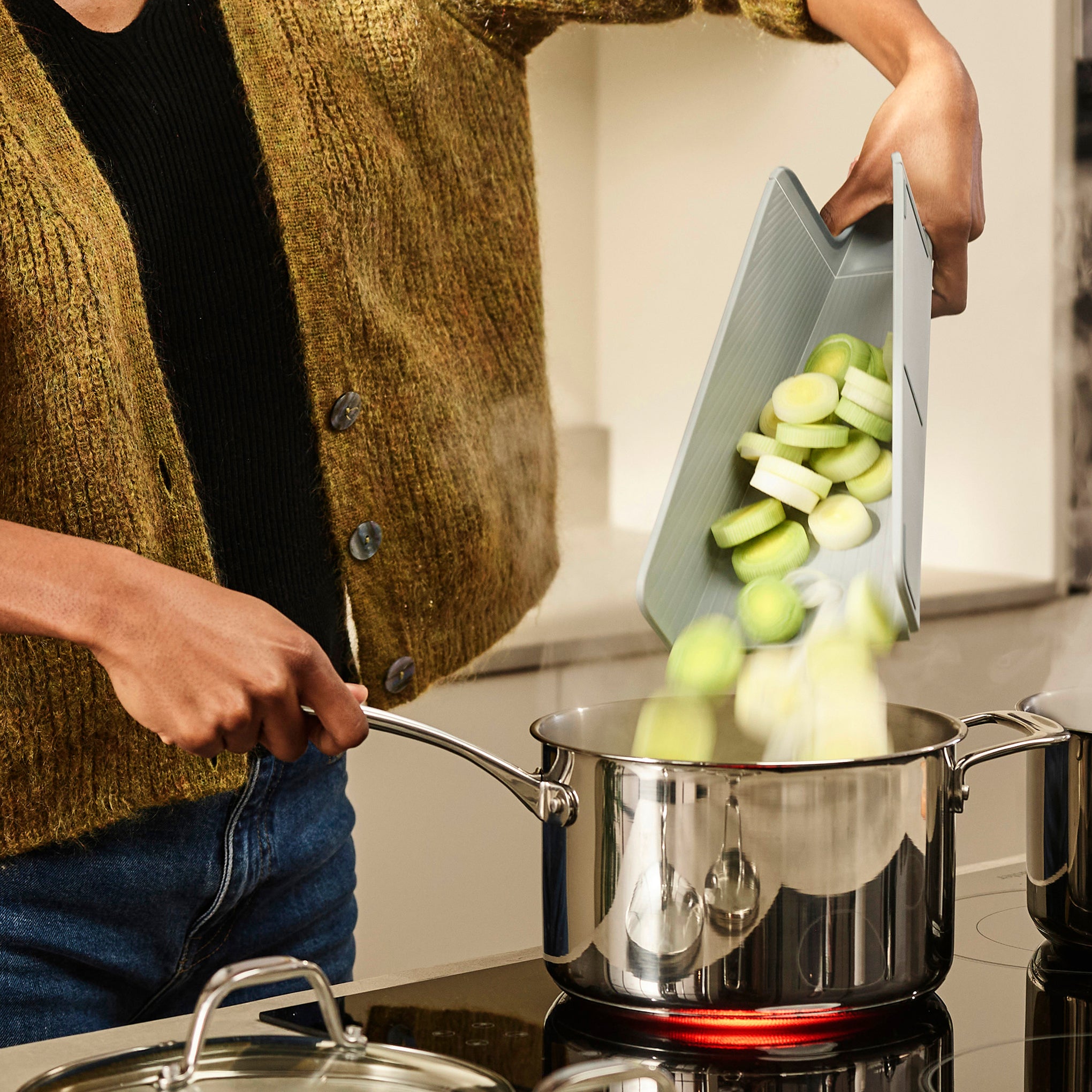 Chop2Pot™ Folding Cutting Board - Pale Blue – MoMA Design Store